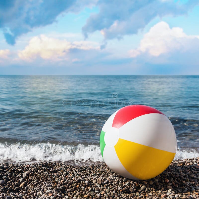 Beach Ball on Ocean Beach stock image. Image of crater - 53508955
