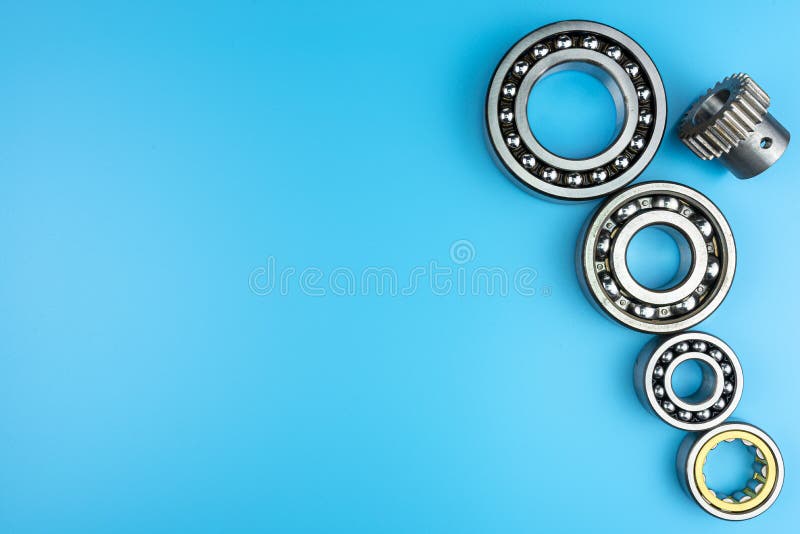 Ball Bearing Lying on a Blue Background with Copy Space on the Left ...