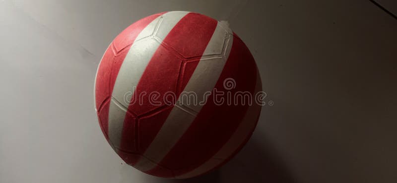 The Ball with a Colour Red and White on the Floor Stock Image - Image ...