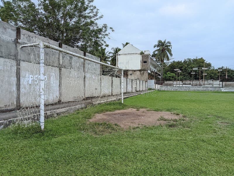 Ball Field with Broken and Muddy Grass Stock Photo - Image of corner ...