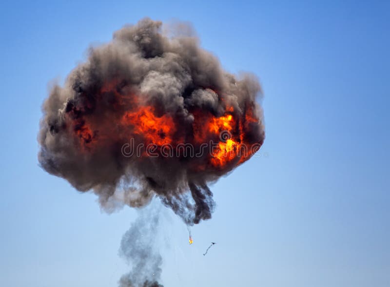 Ball of Fire and Column of Smoke from a Muntions Explosion Stock Photo ...