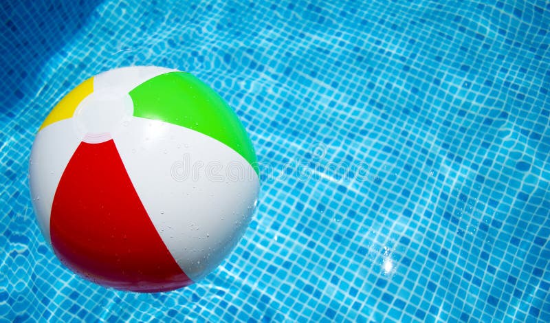 Ball Floating in a Blue Swimming Pool Stock Photo - Image of ...