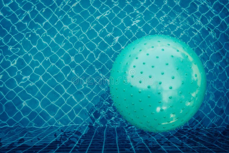 Ball floating on the pool stock image. Image of holiday - 143606003