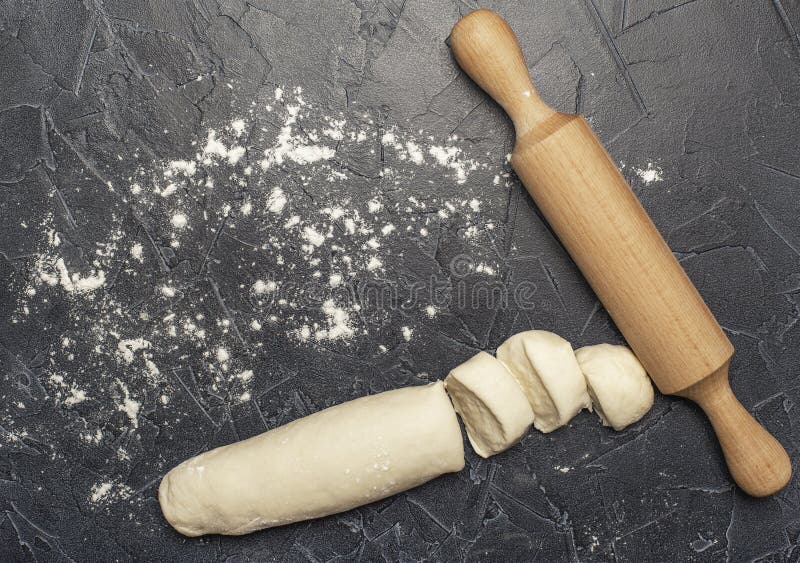 Ball of Fresh Raw Dough, Flour and Rolling Pin Top View Stock Photo ...
