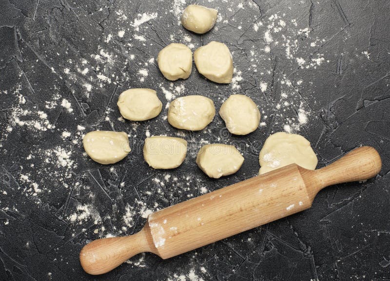 Ball of Fresh Raw Dough, Flour and Rolling Pin Top View Stock Photo ...