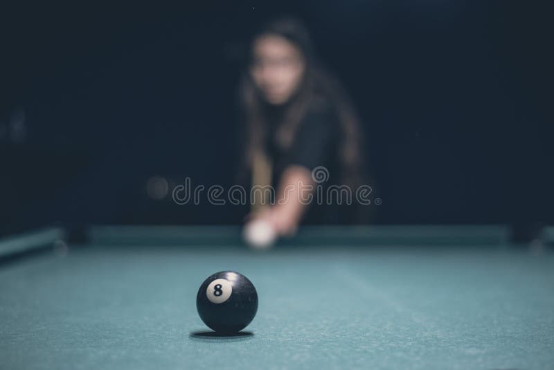 8-Ball with Girl in Background Stock Image - Image of game, focus ...