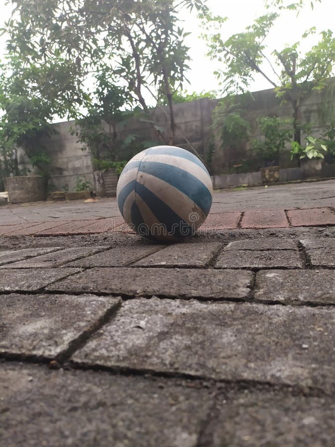 Ball at paving stone stock image. Image of branch, iron - 203934525
