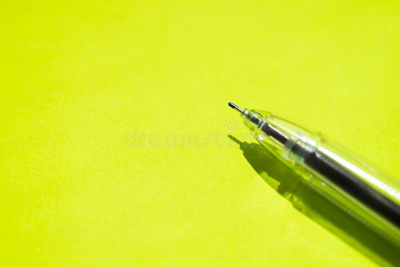 Ball Pen on a Bright Green Paper. Copy Space Stock Image - Image of ...
