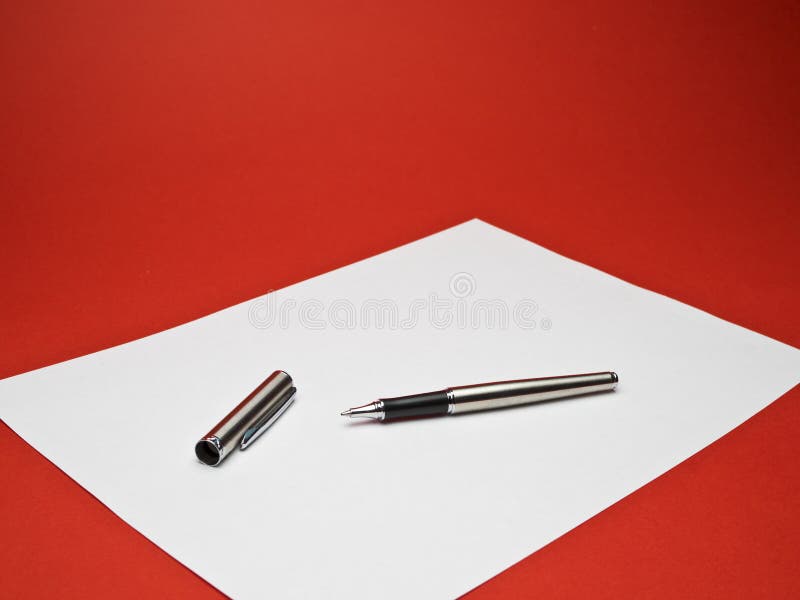 Ball Point Pen on White Paper with Red Background Stock Image - Image ...