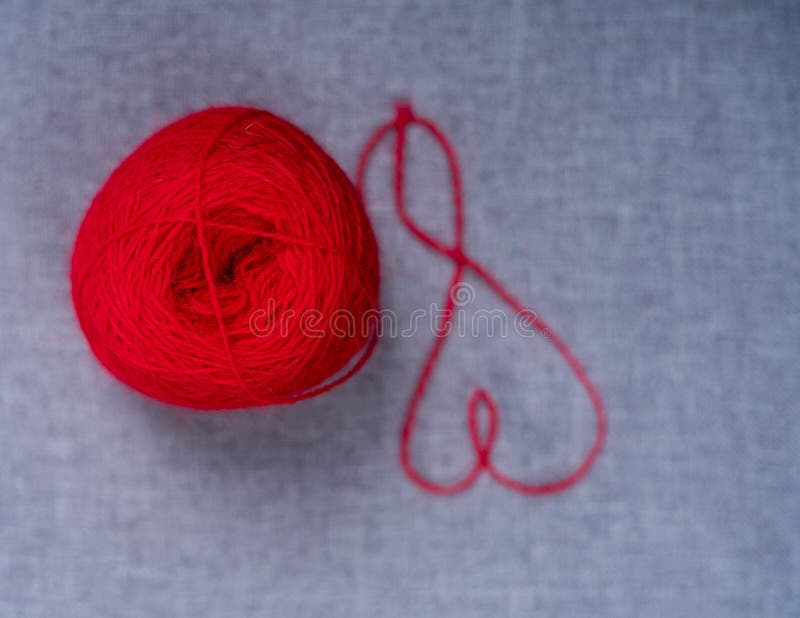 A Ball of Red Thread on a Black Background. Stock Photo - Image of pink ...
