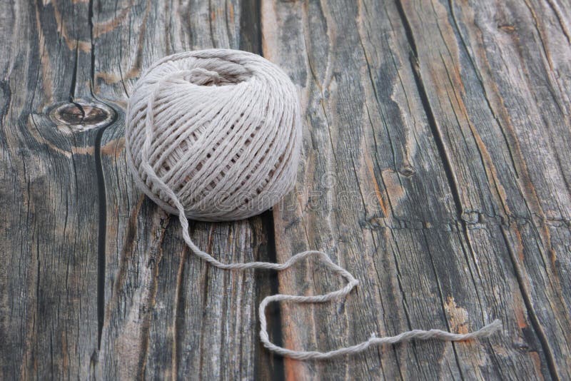 Ball of string on wood stock photo. Image of natural - 340133368