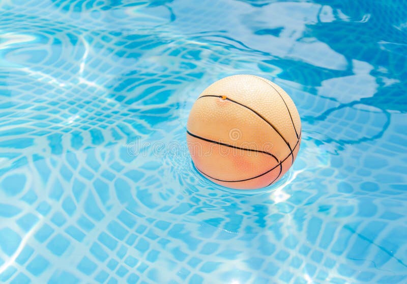 Ball in swimming pool stock photo. Image of recreational - 74510068