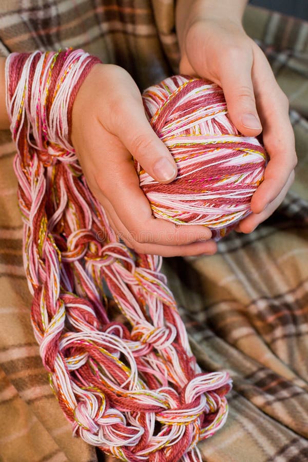 Ball of Thread in Their Hands. Stock Image - Image of plaid, unfinished ...