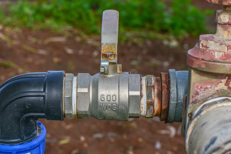 Ball Valve and Plastic Pipe on an Irrigation Field in the Village 2 ...
