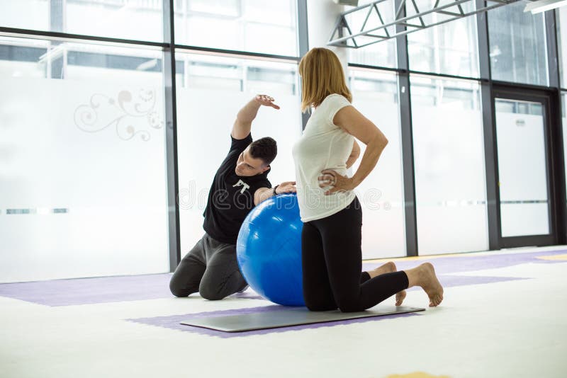 Ball workout in gym stock image. Image of rear, lifestyle - 106301473