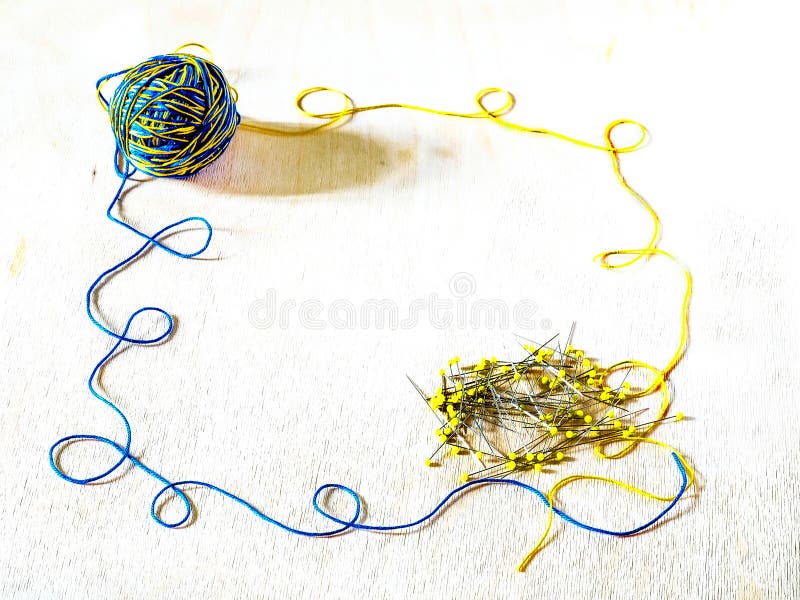 A Ball of Yarn and Sewing Pins Stock Photo - Image of needle, blue ...