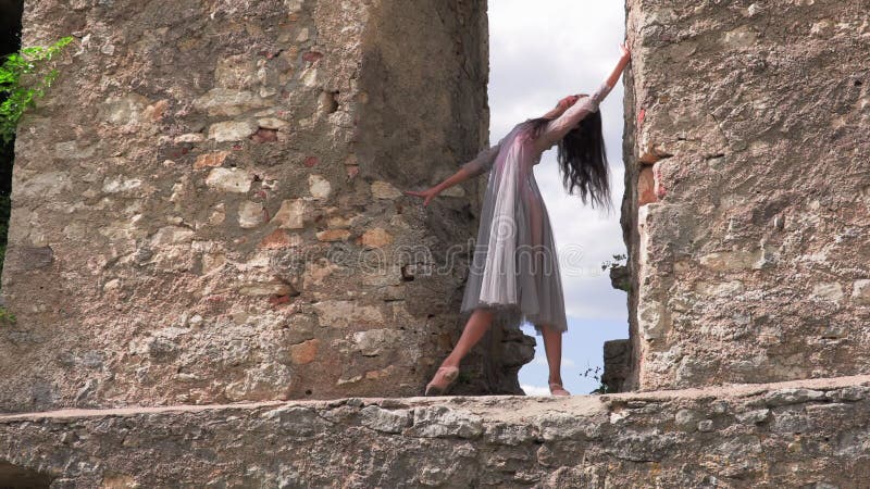 Ballerina Dancing on the Stage of the Old Castle Stock Footage - Video ...