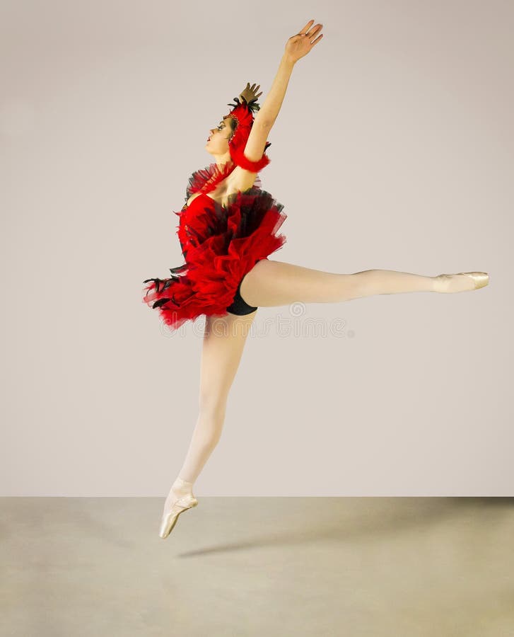 Ballerina Jumping in Dance Position in Stage Costume Stock Image ...