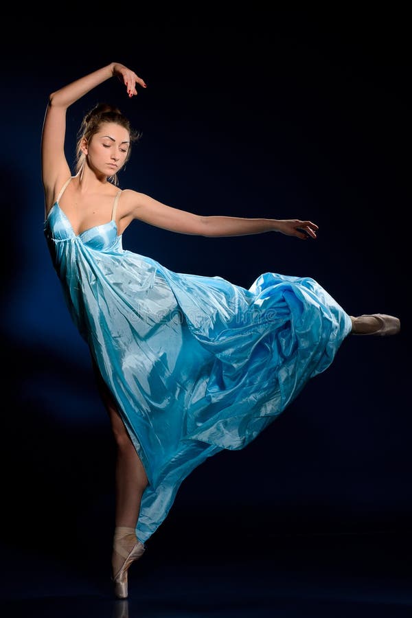 Ballerina Jumping, Flying in Blue Dress Stock Image - Image of beauty ...