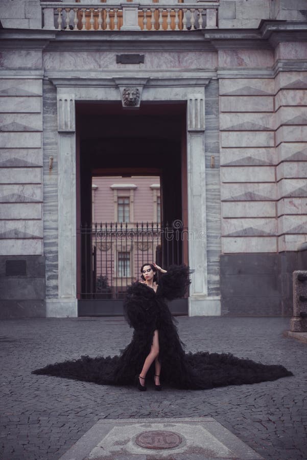 Ballerina in a Long Black Dress Stock Photo - Image of female, action ...