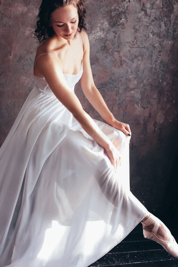 Ballet Dancer Ballerina in Beautiful Thin Flying White Dress is Posing ...