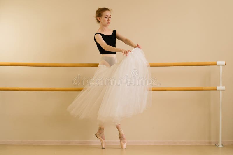 A Ballet Dancer Showcases a Dynamic Pose Stock Photo - Image of studio ...