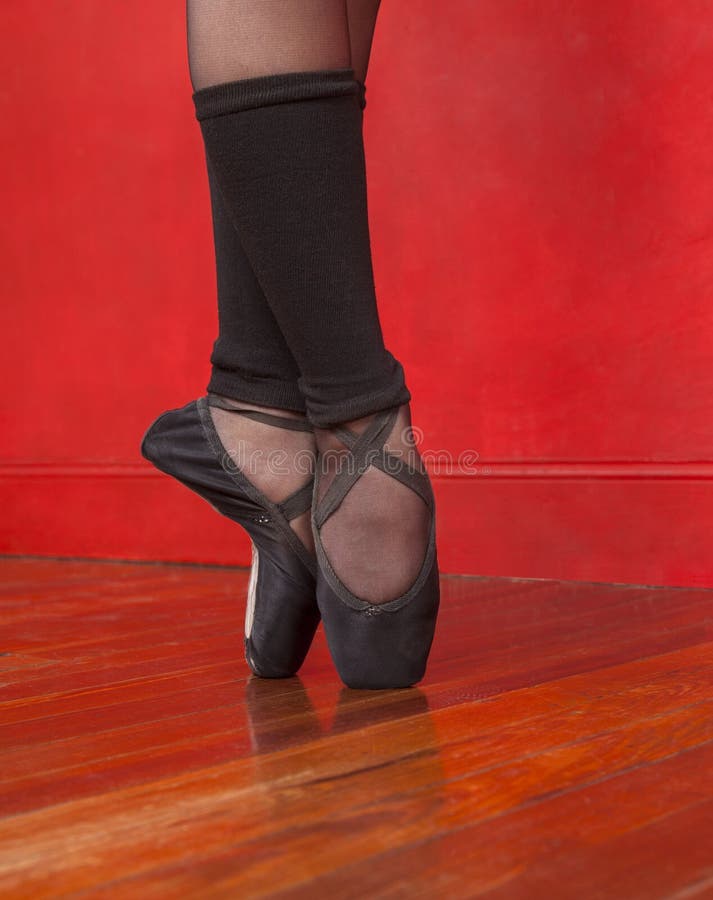 Ballet Dancer Standing On Pointe In Studio Stock Photo - Image of ...