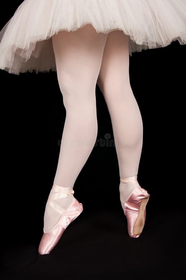 Ballet dancer on her toes stock image. Image of dress - 14821681