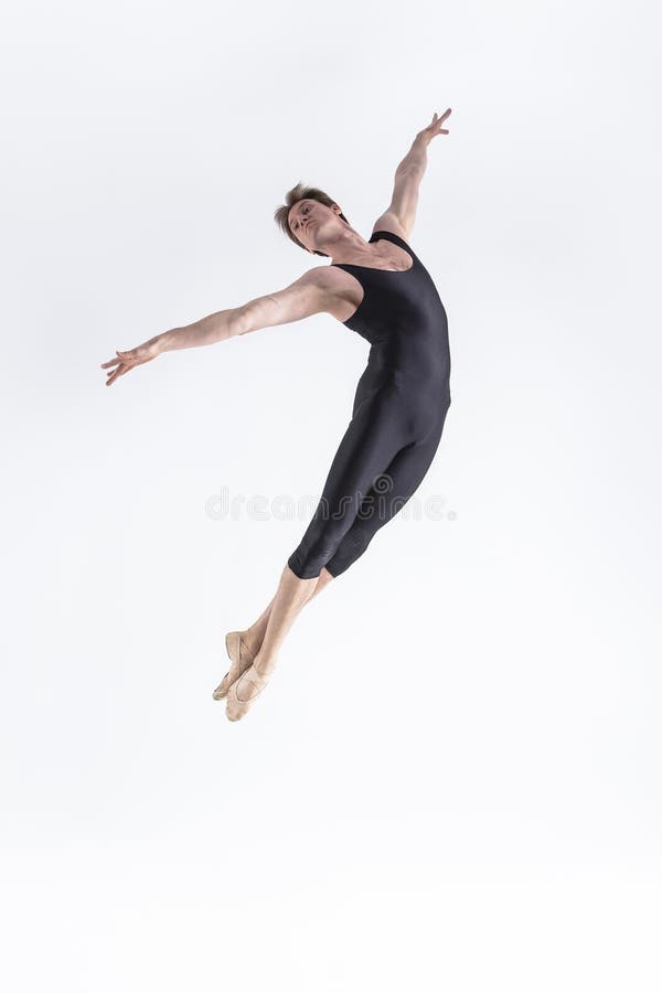 Ballet Dancer Young Man in Black Dance Suit Posing in Flying Ballanced ...