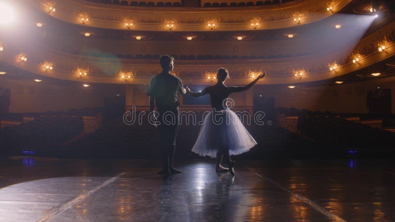 Ballet Dancers Bow Down in Front of Rows of Seats Stock Video - Video ...