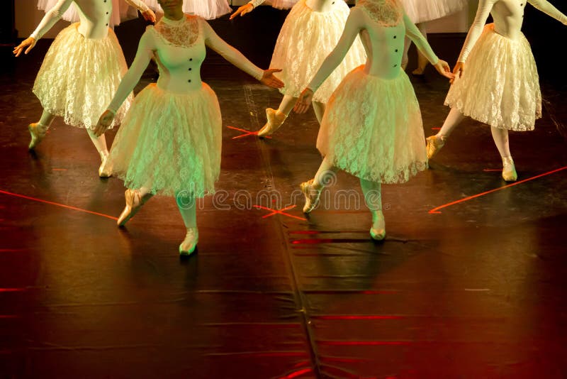 Ballet Dancers with Classical Dresses Performing a Ballet on Blur ...