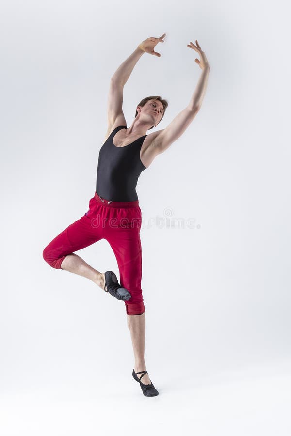 Contemporary Ballet of Flexible Athletic Man Posing in Red Tights in ...