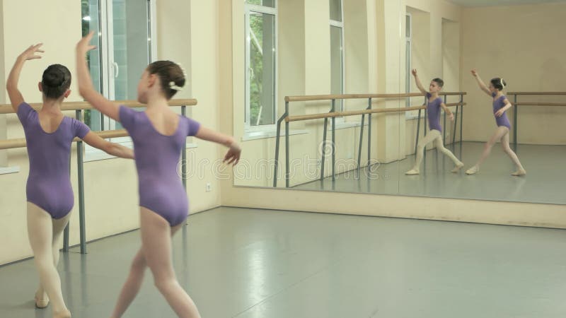 Ballet Girls Practicing Dance Element at Studio. Stock Footage - Video ...