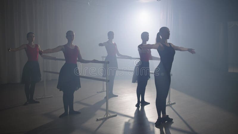 Ballet Group Repeats the Movements of the Coach while Holding on To the ...