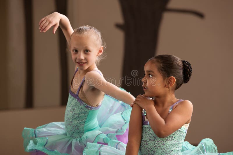 Ballet Students Helping Each Other Stock Image - Image of ballerina ...
