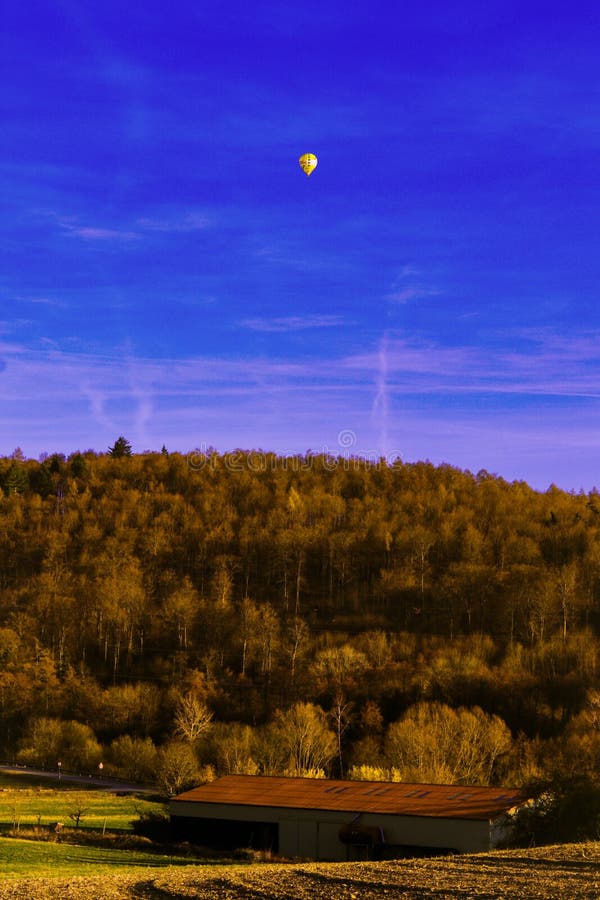 Balloon in the Blue Sky Over the Forest. Winter. Stock Image - Image of ...
