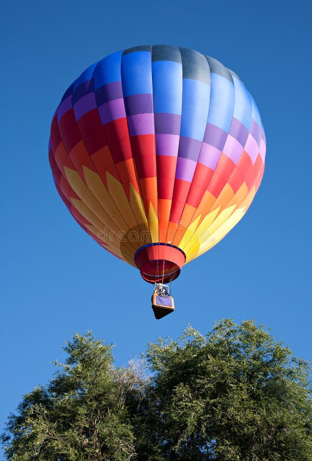 Balloon Over Tree stock image. Image of drifting, flight - 15889289