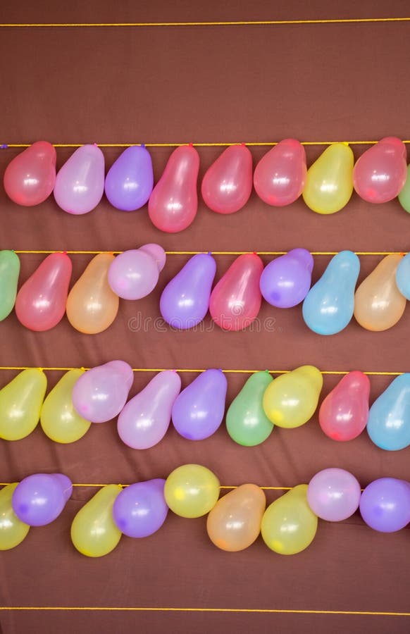 Balloon Shooting Game with Balloons on a String Stock Photo - Image of ...