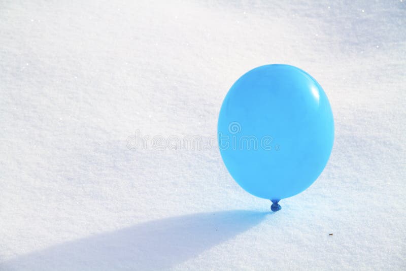 Balloon in the snow stock photo. Image of rubber, plastic - 12390056