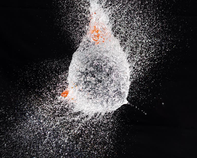 Balloon Splash! Freeze Motion of Water Drops. Stock Image - Image of ...