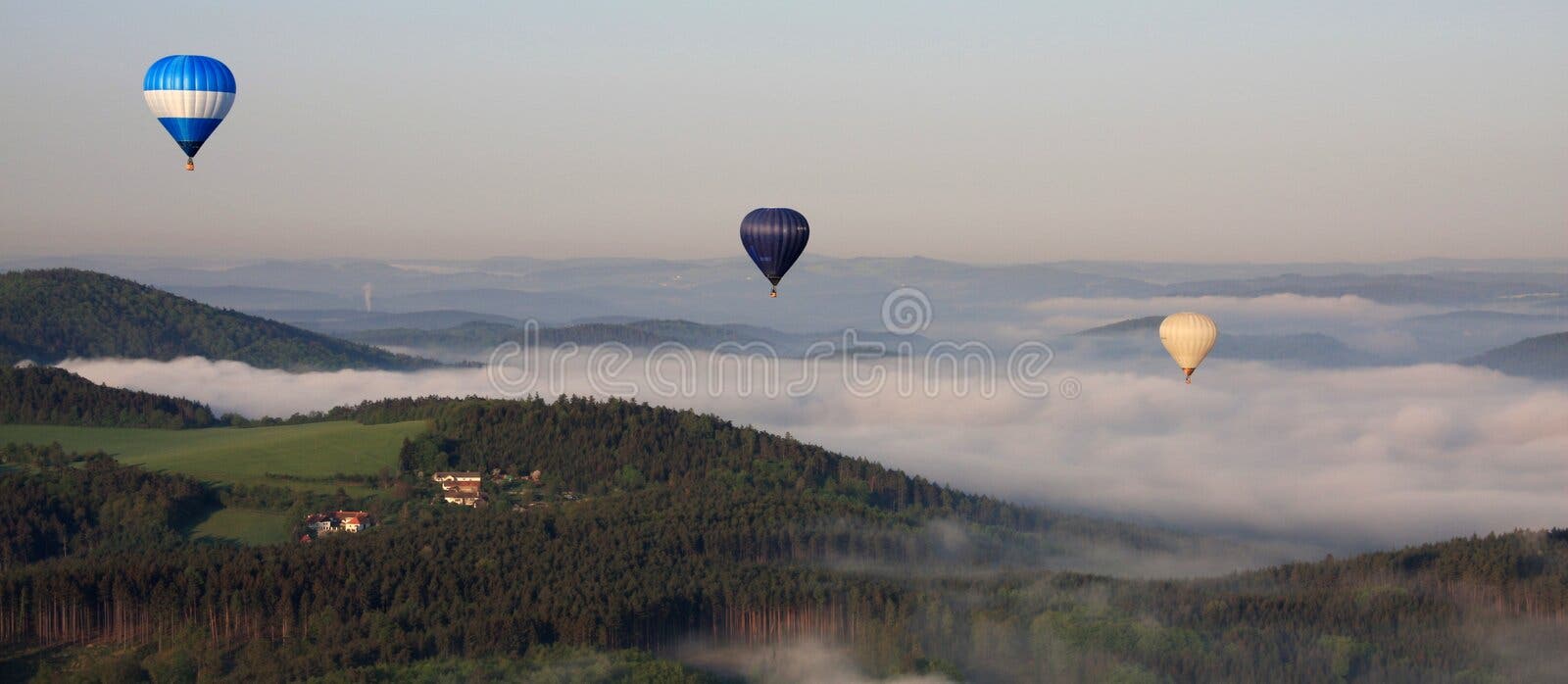 Hot Air Balloon Flying at Dawn Stock Photo - Image of dawn, moody ...
