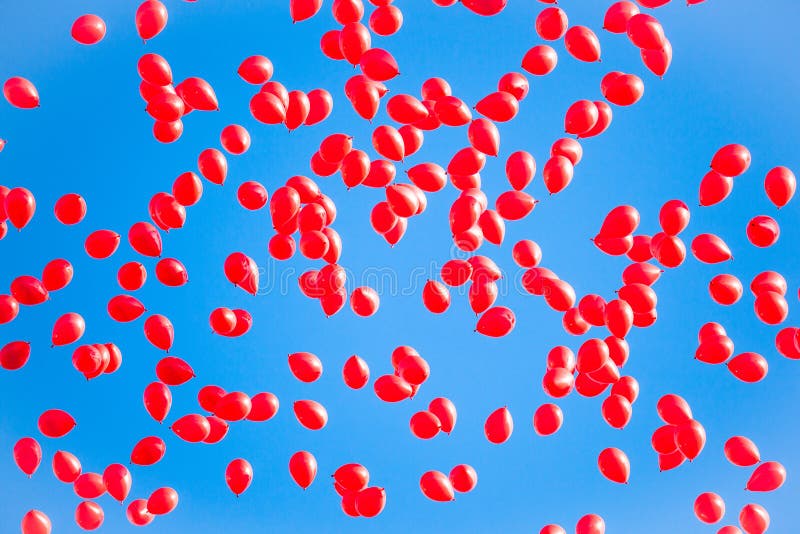 Red Balloons Flying in the Sky at Holiday Stock Photo - Image of ...