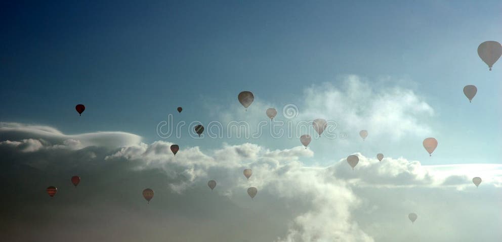 Balloons in the mist stock photo. Image of fanciful, overhead - 1583102