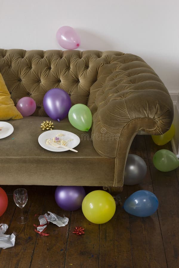 Balloons Scattered Around Sofa Stock Photo - Image of messy, coffee ...