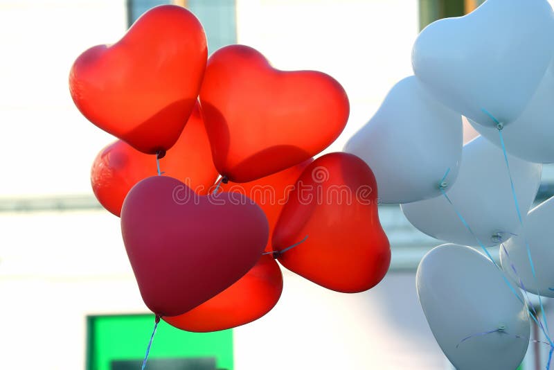 Balloons in the Shape of a Heart Fluttering from the Wind in the Stock ...