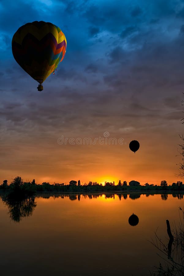 Balloons at sunset stock image. Image of adventure, sunset - 58397089