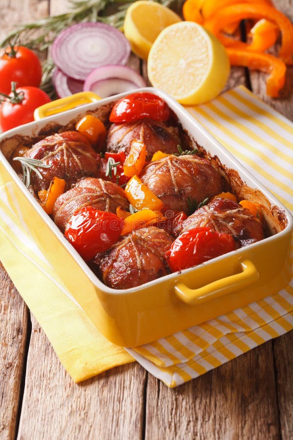 Ballotine Rabbit Baked with Tomatoes, Pepper and Rosemary Close Stock ...