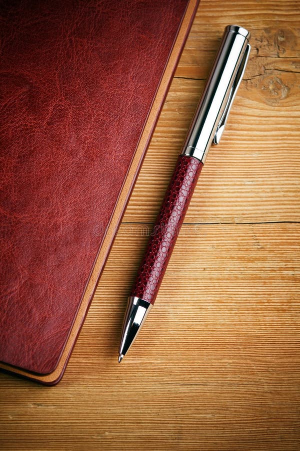 Ballpoint Pen and Notebook stock image. Image of embossed - 27149771