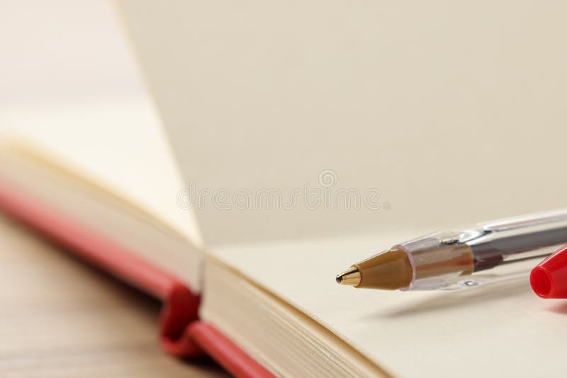 Ballpoint Pen and Notebook on Table, Closeup. Space for Text Stock ...