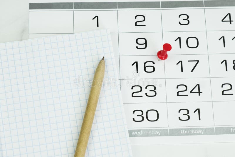 Ballpoint Pen, Notepad and Calendar with Date Marked Stock Photo ...